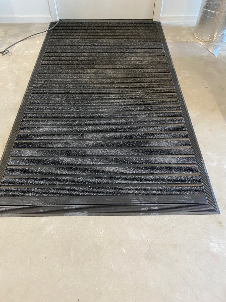 Warehouse office keeps tidy with 'Mat-in-a-Box' | Gradus