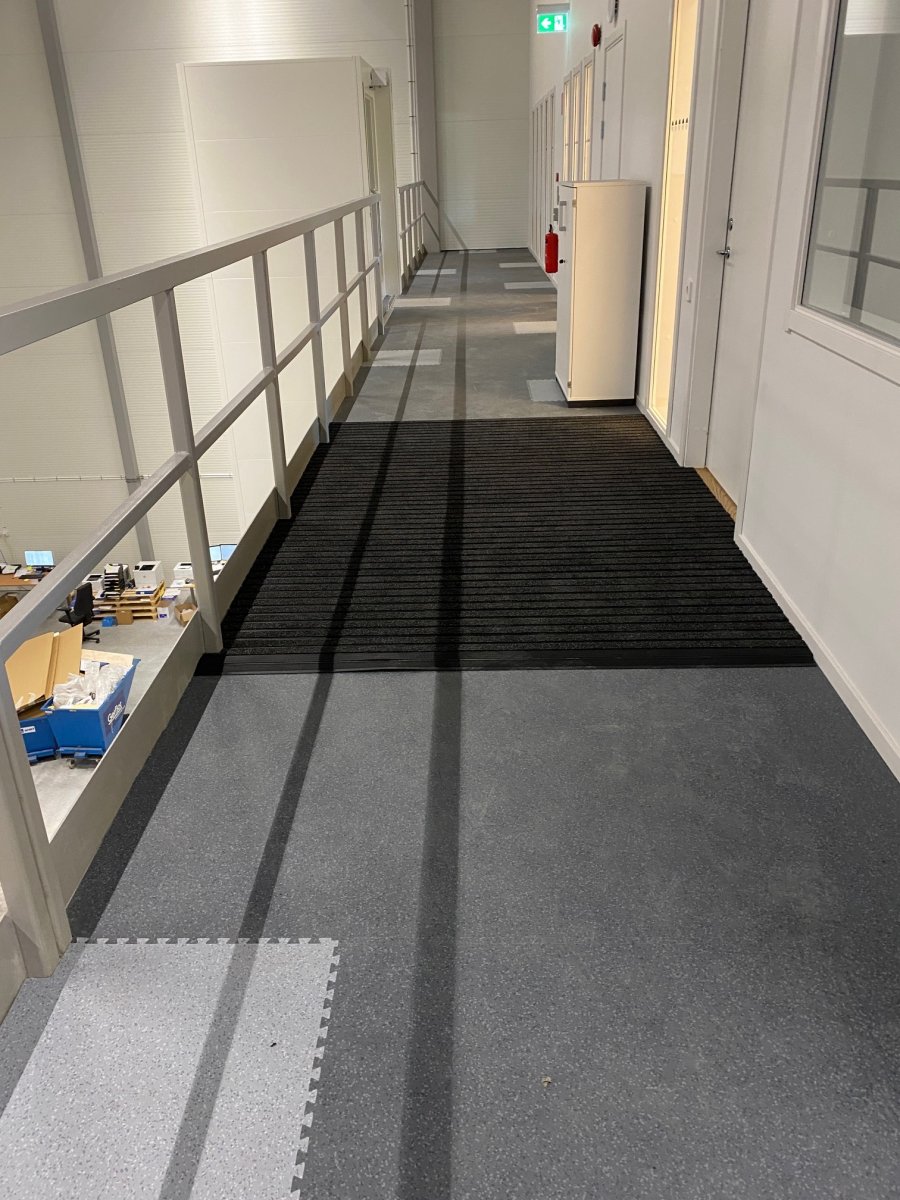 Warehouse office keeps tidy with 'Mat-in-a-Box' | Gradus